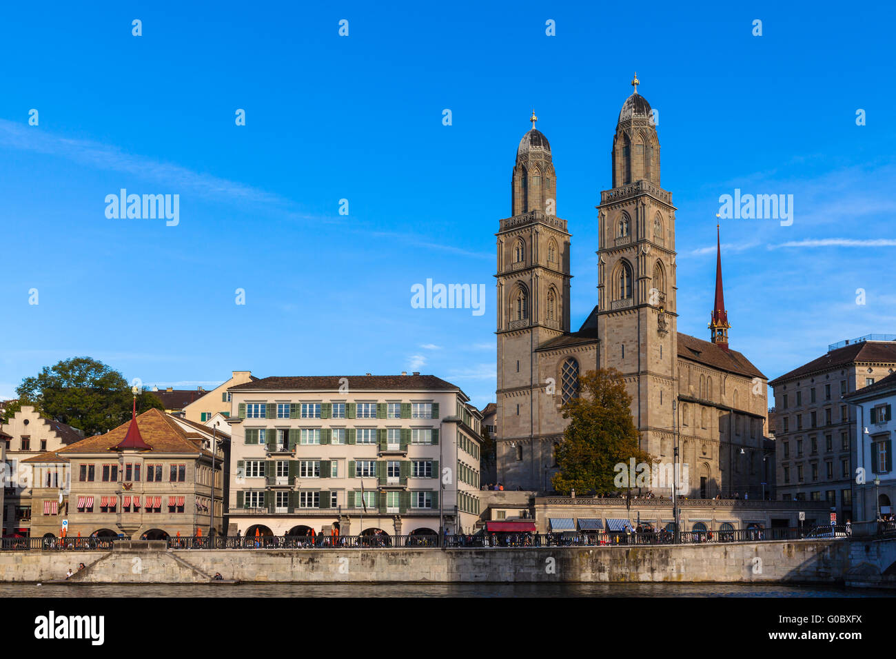 Beautiful view of Zurich old town with Grossmunster Church and Limmat ...