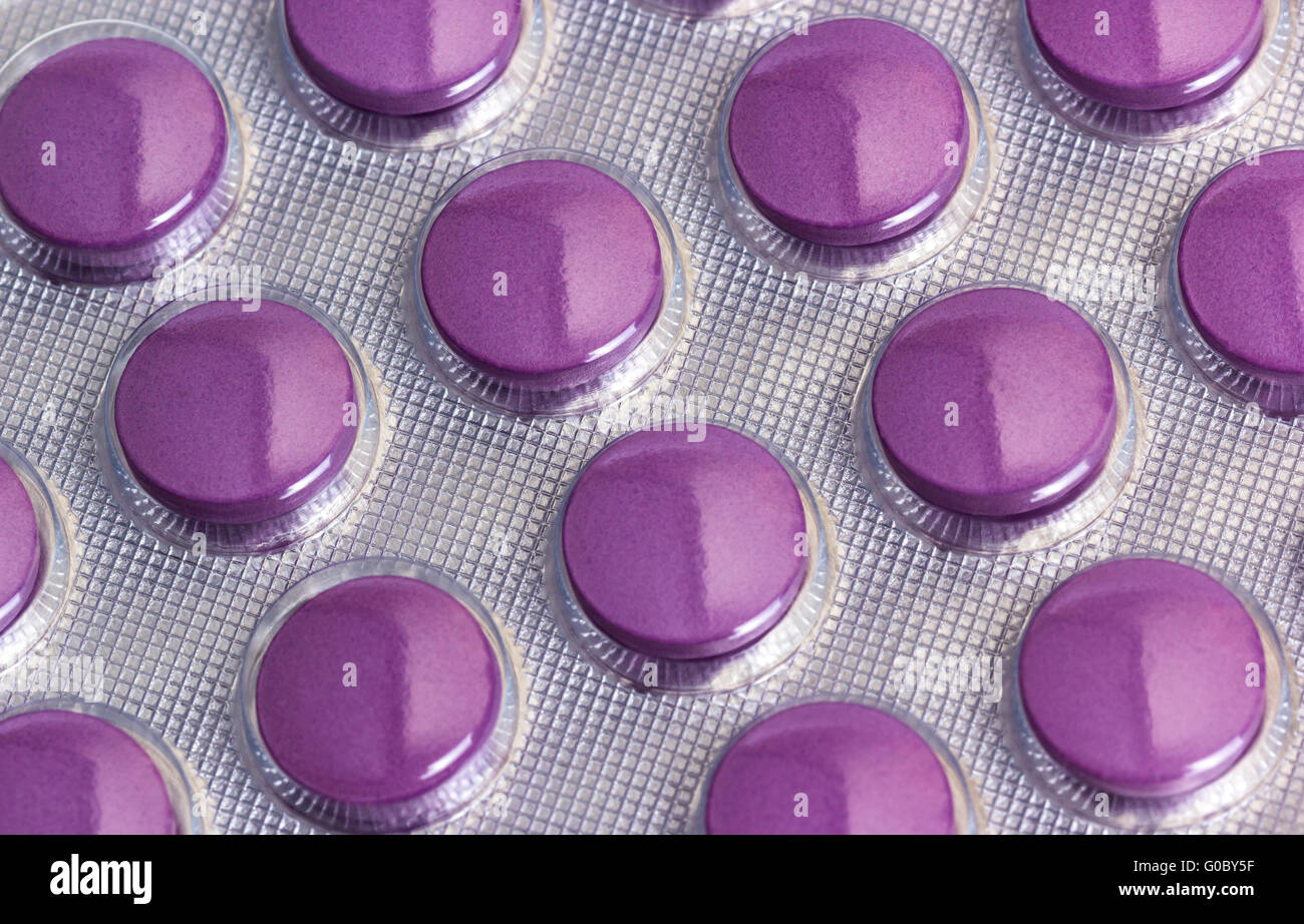 Close-up medicine pills packed in blisters pack Stock Photo - Alamy