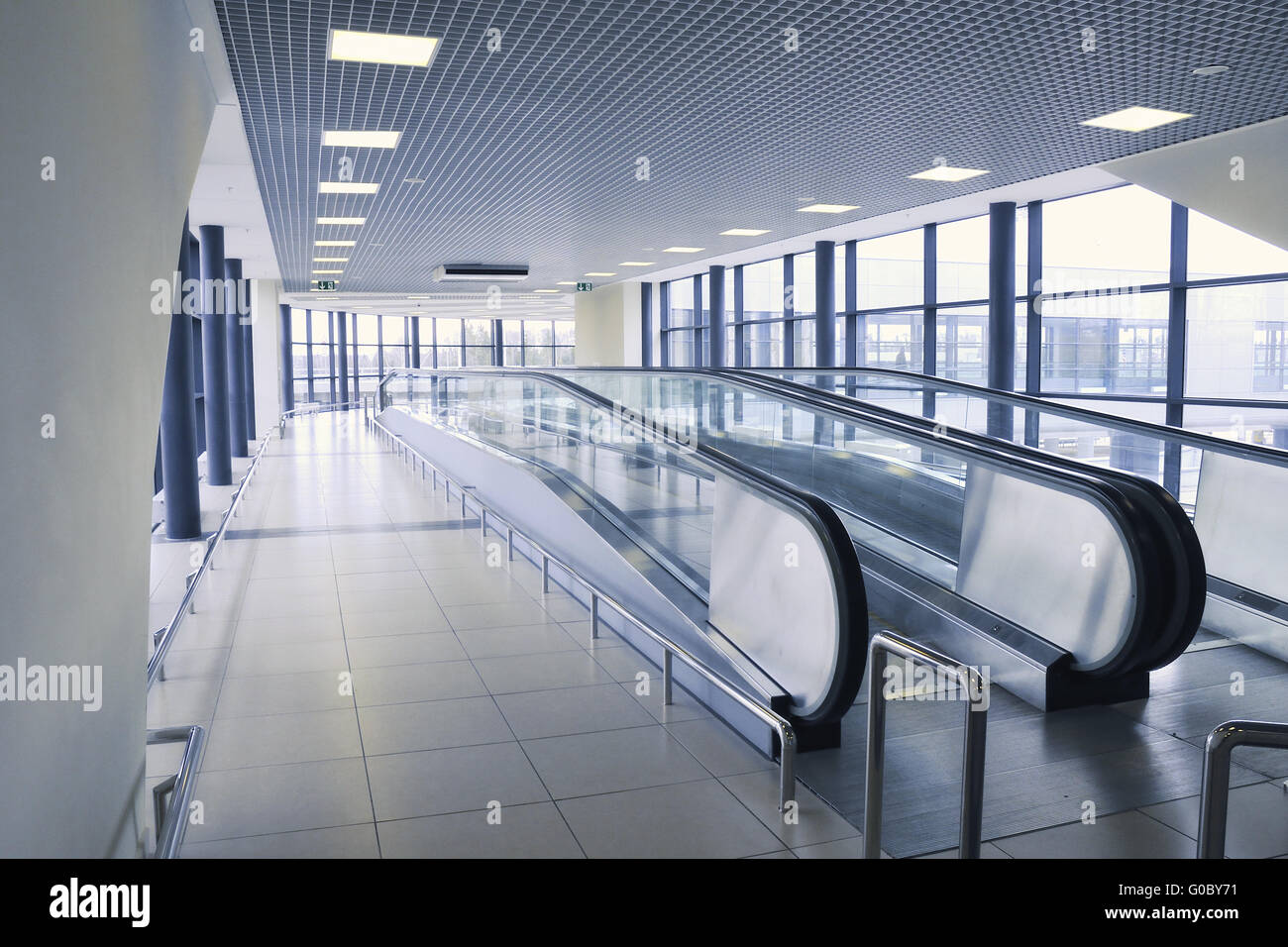 pedestrian pathway inside modern airport building Stock Photo - Alamy