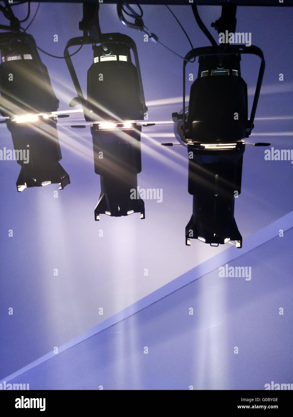 multiple spotlights on a theatre stage lighting rig Stock Photo - Alamy
