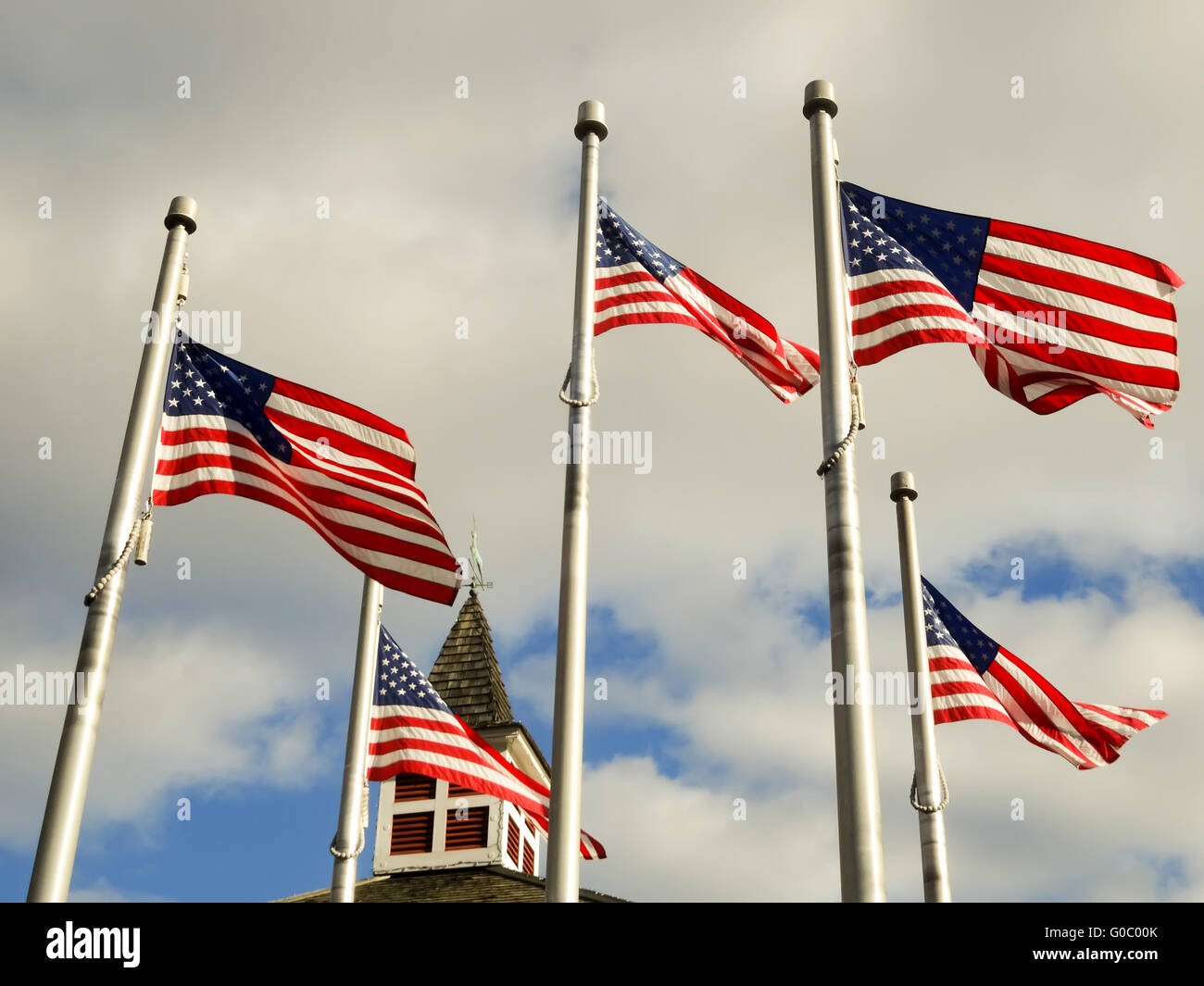 red white and blue flags on a pole with american architecture Stock ...