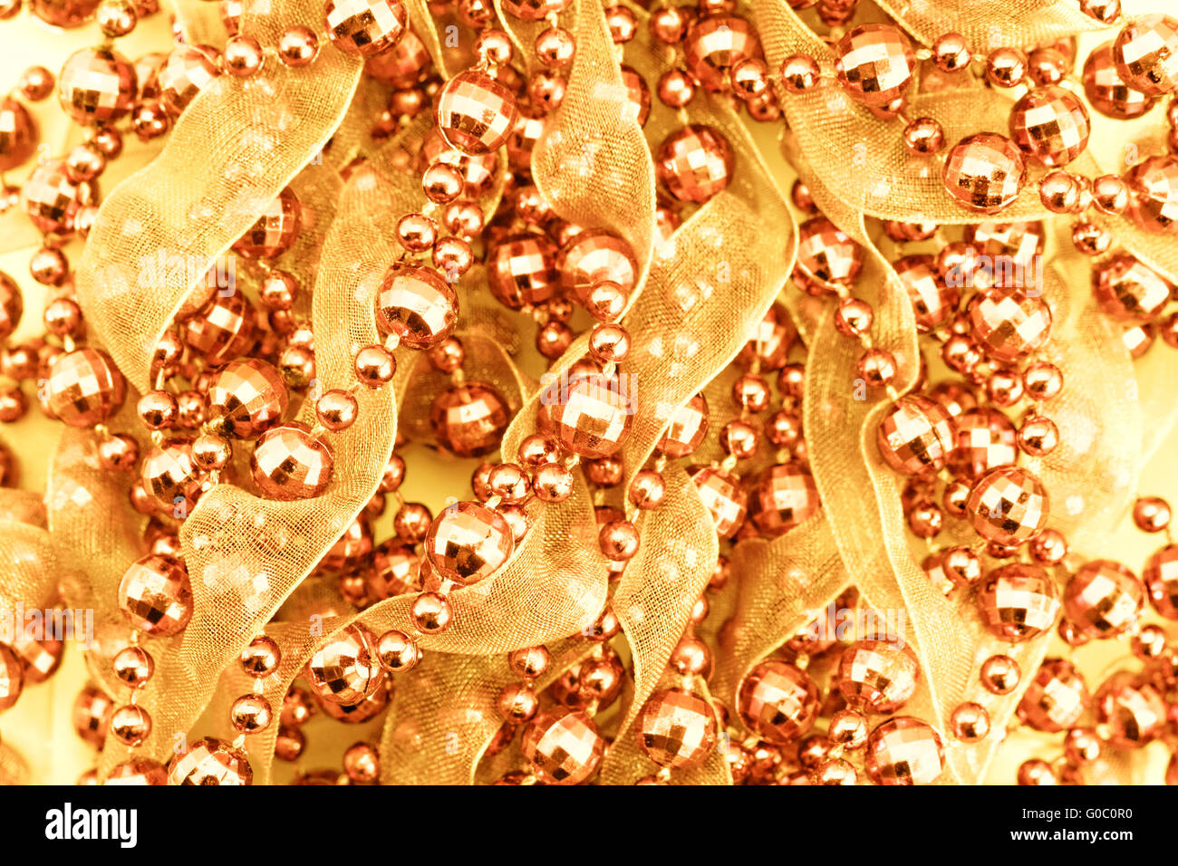 Close up of golden garland. Whole background Stock Photo - Alamy