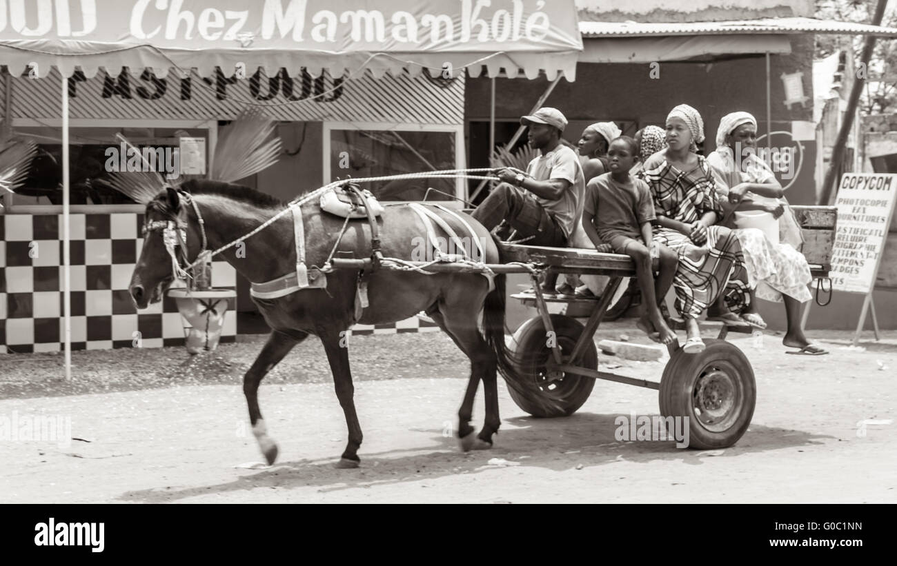 Mbour, Senegal - July, 2014: Local villagers in the outskirts of the ...