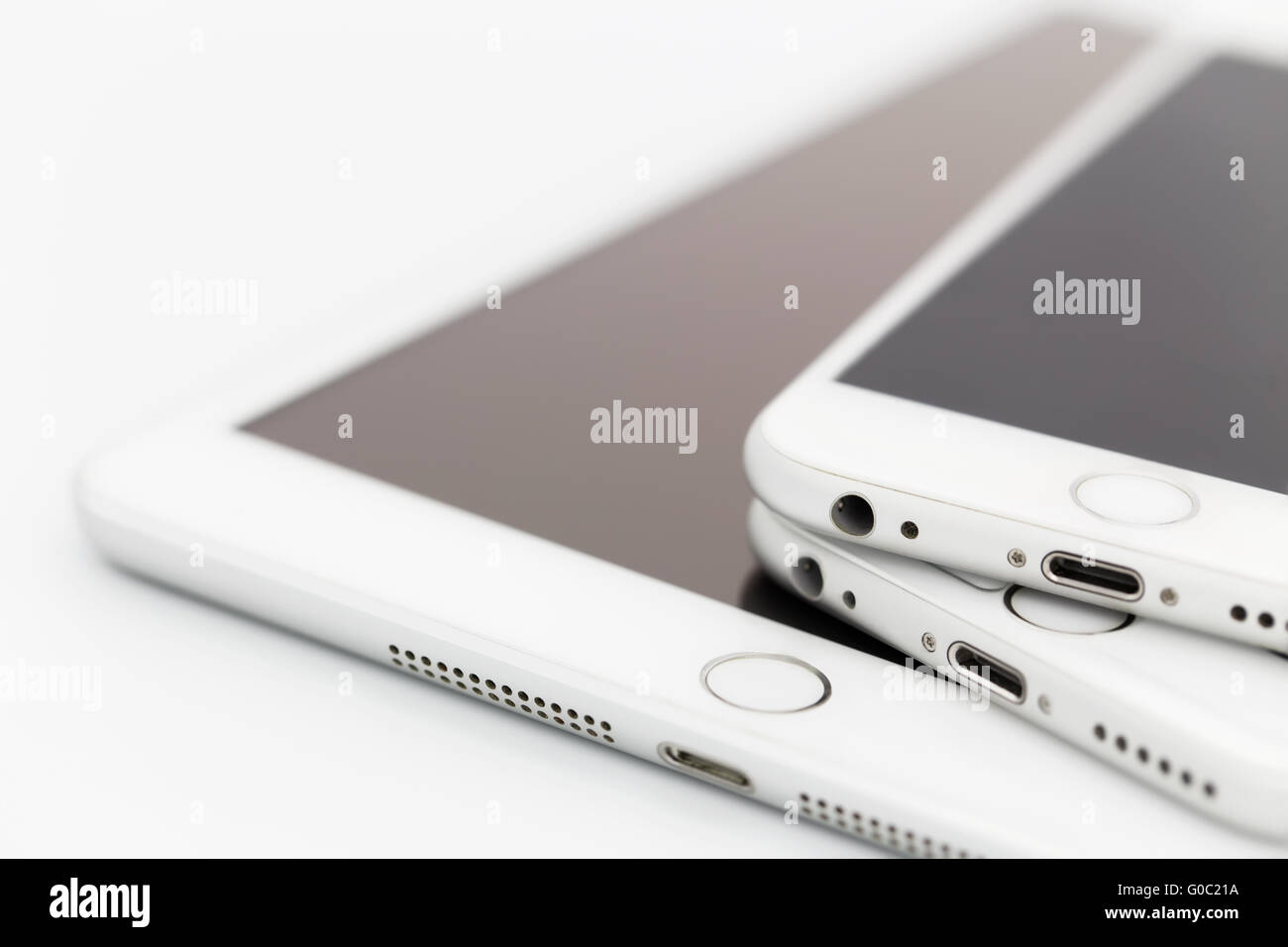 stacked cell phone and tablet Stock Photo - Alamy