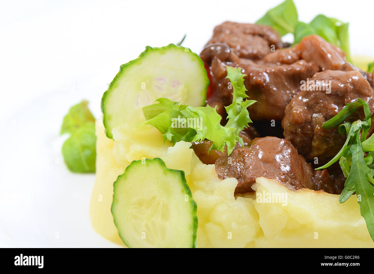 Meat quenelles and veal with sauce from mushrooms from mashed potatoes ...