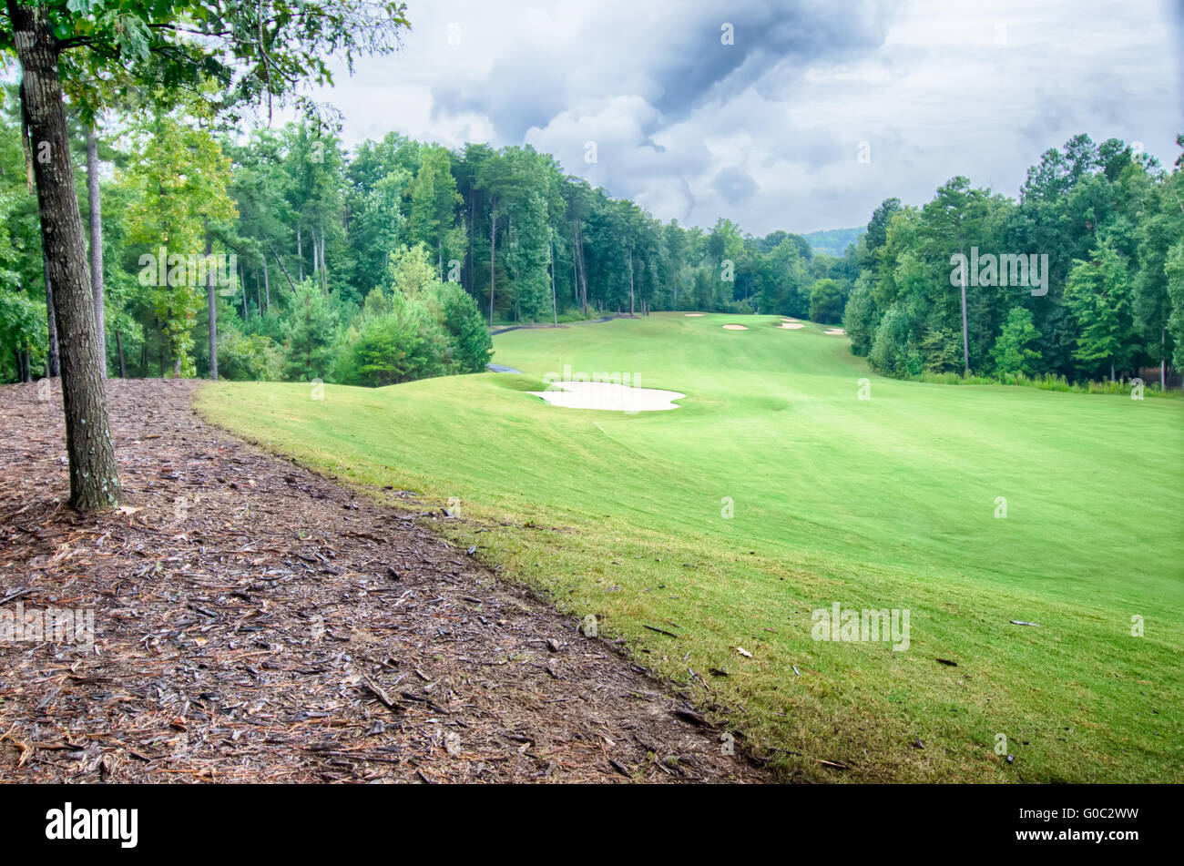 luxurious golf course on a cloudy day Stock Photo - Alamy