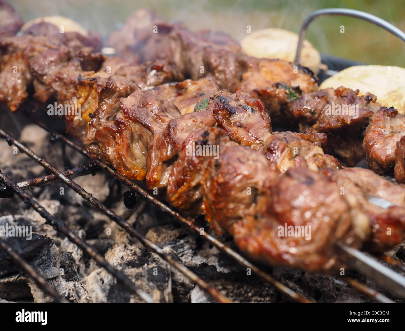 Juicy meat cooked over fire hi-res stock photography and images - Alamy