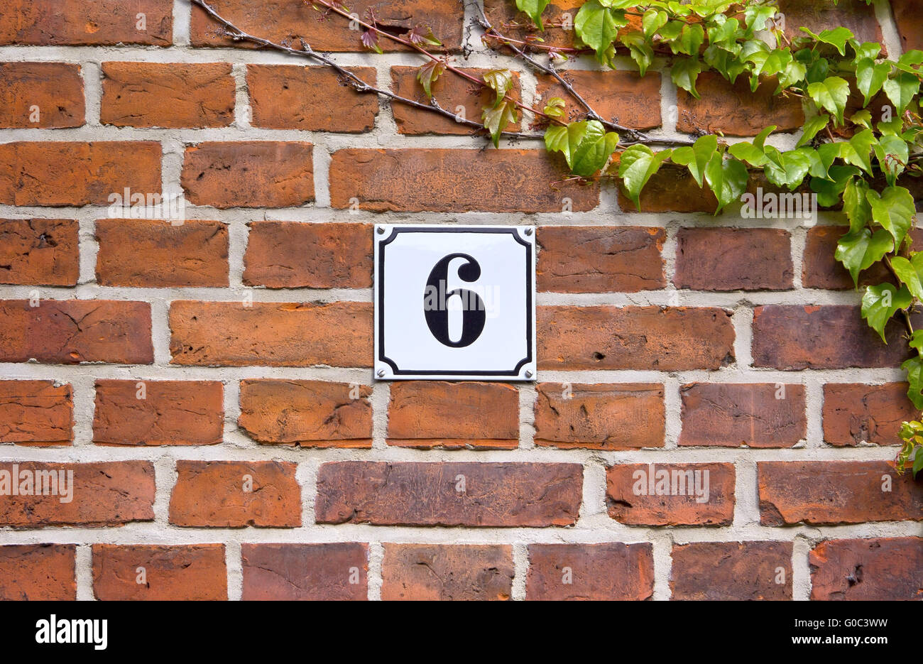 Enamel sign number 6 Stock Photo - Alamy