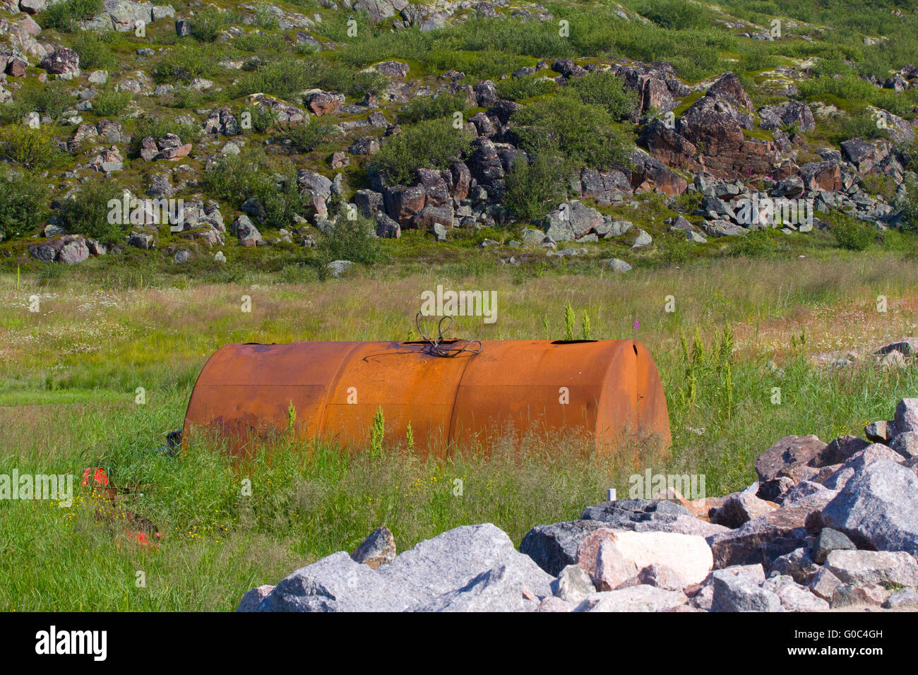 empty barrels in the Arctic environmental pollution Stock Photo - Alamy