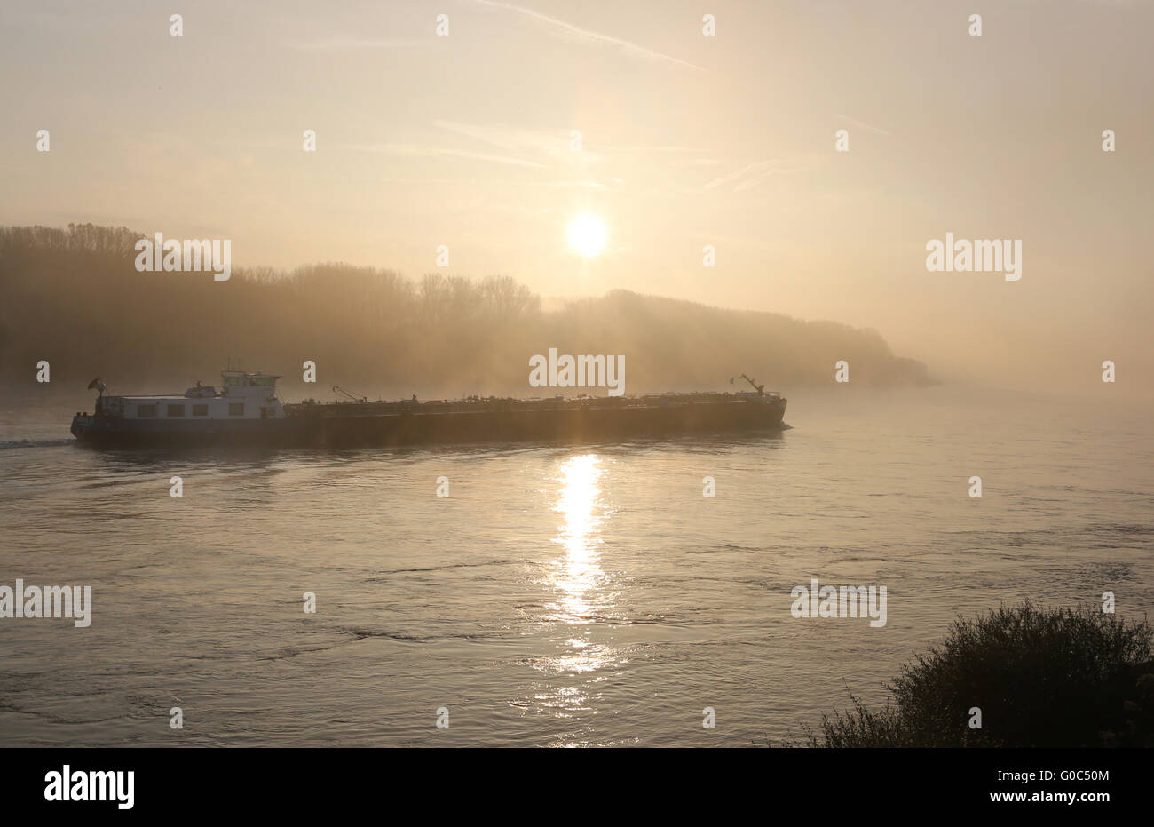 Cargo Ship in Fog Stock Photo - Alamy
