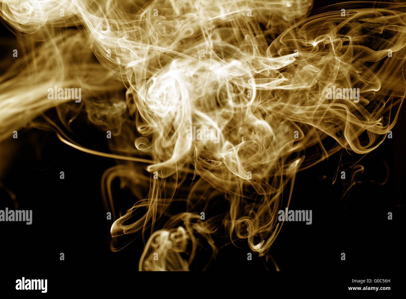 Beautiful smoke on the black background - macro photo Stock Photo - Alamy