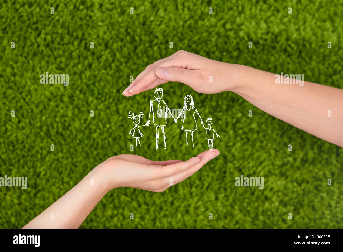 Family life insurance,Protecting Family Stock Photo - Alamy