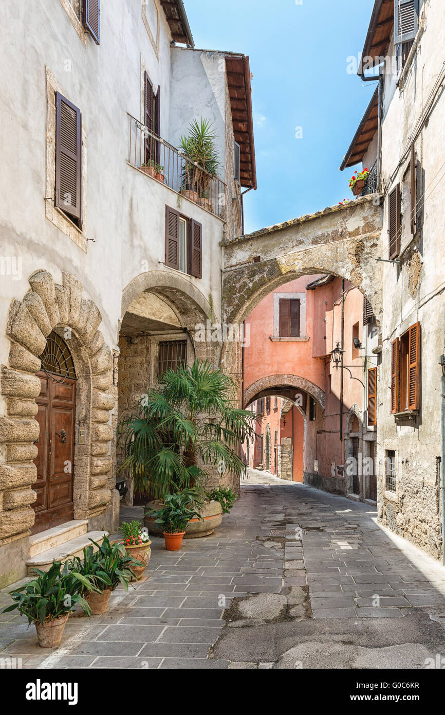 Pretty street in the ancient city of Tuscany Stock Photo - Alamy