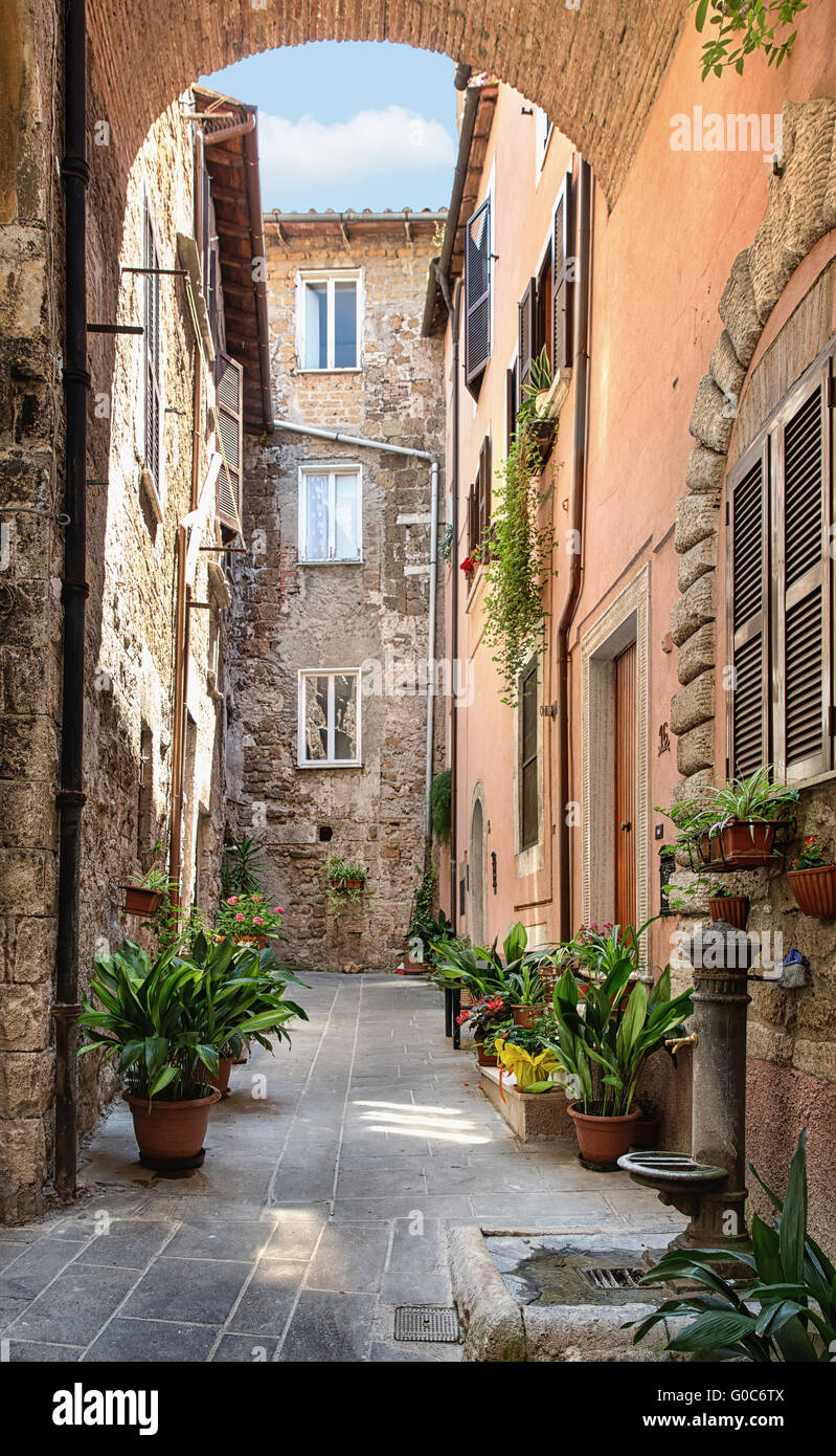 Pretty street in the ancient city of Tuscany Stock Photo - Alamy