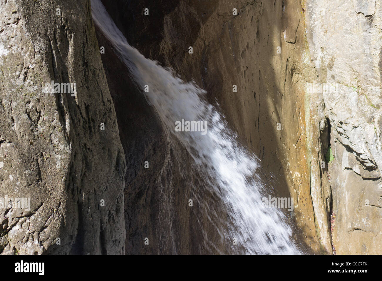 Waterfall closeup in the Alps Stock Photo - Alamy