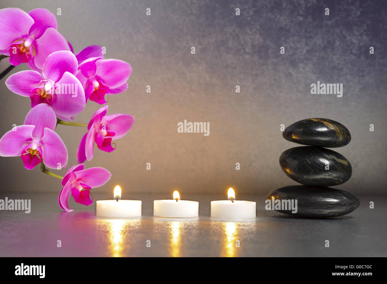 Japanese ZEN garden with yin yang and candle Stock Photo - Alamy