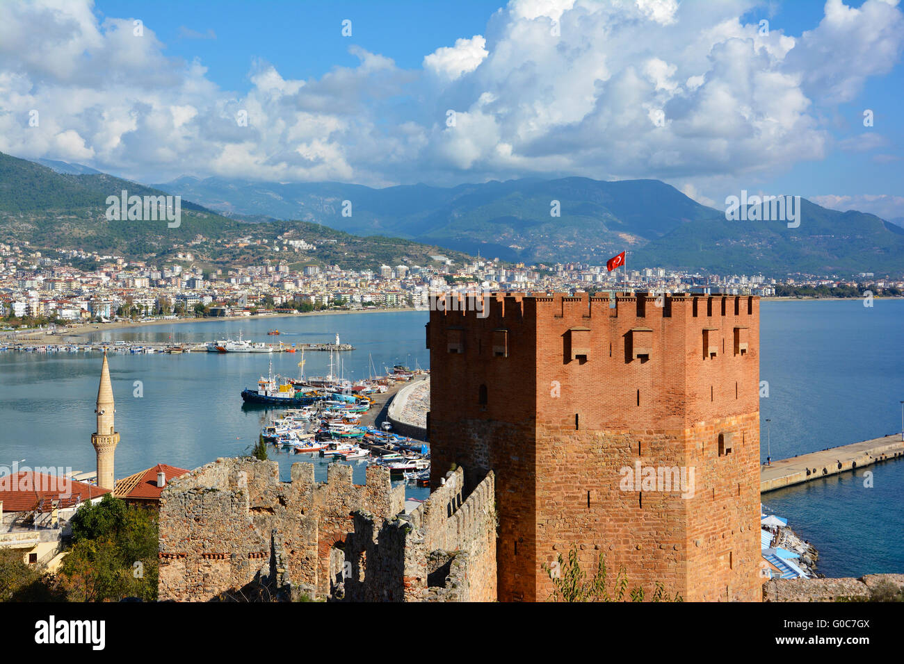 Port of Alanya Turkey with red tower Stock Photo - Alamy