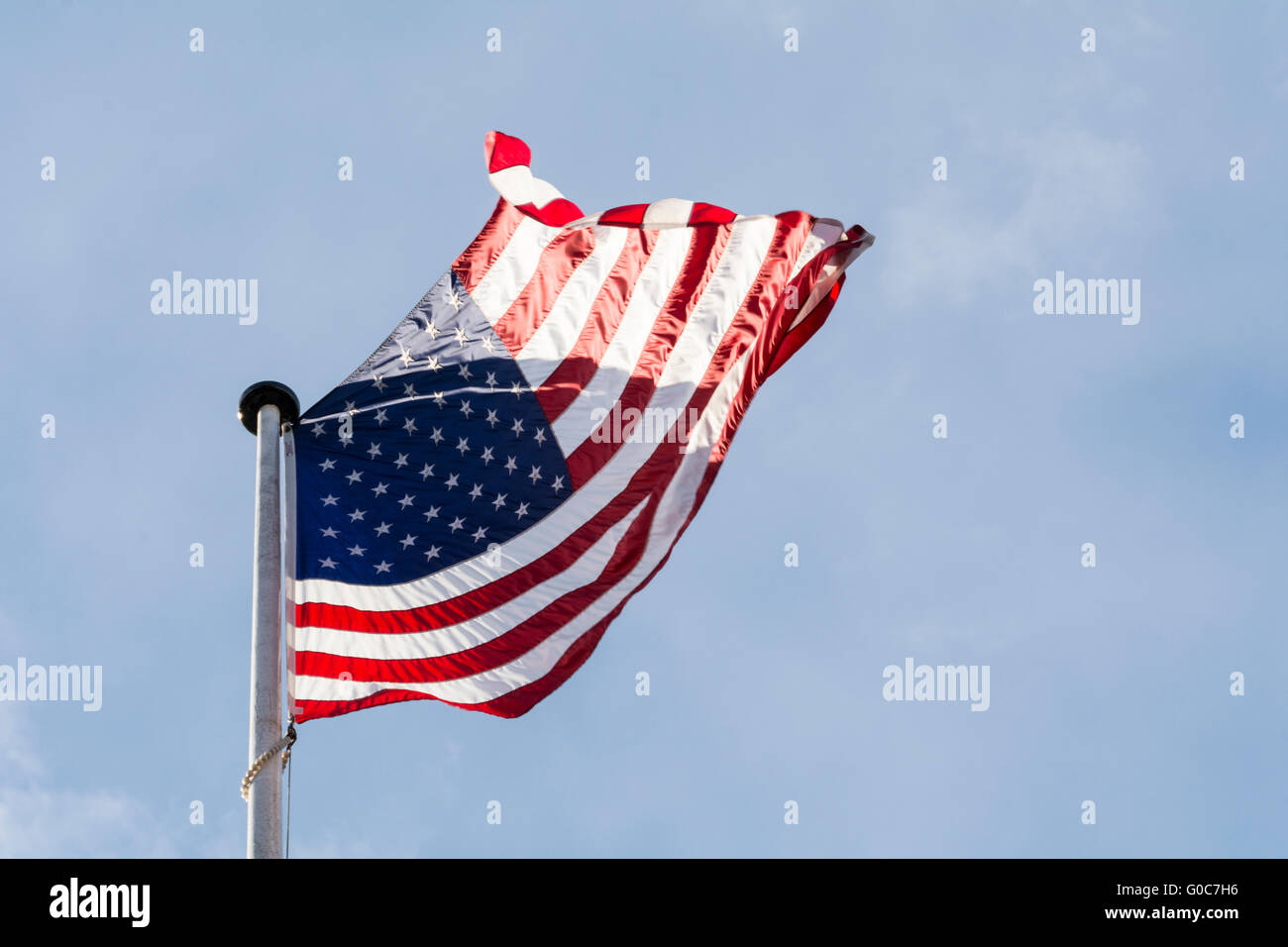 Windy flag hi-res stock photography and images - Alamy