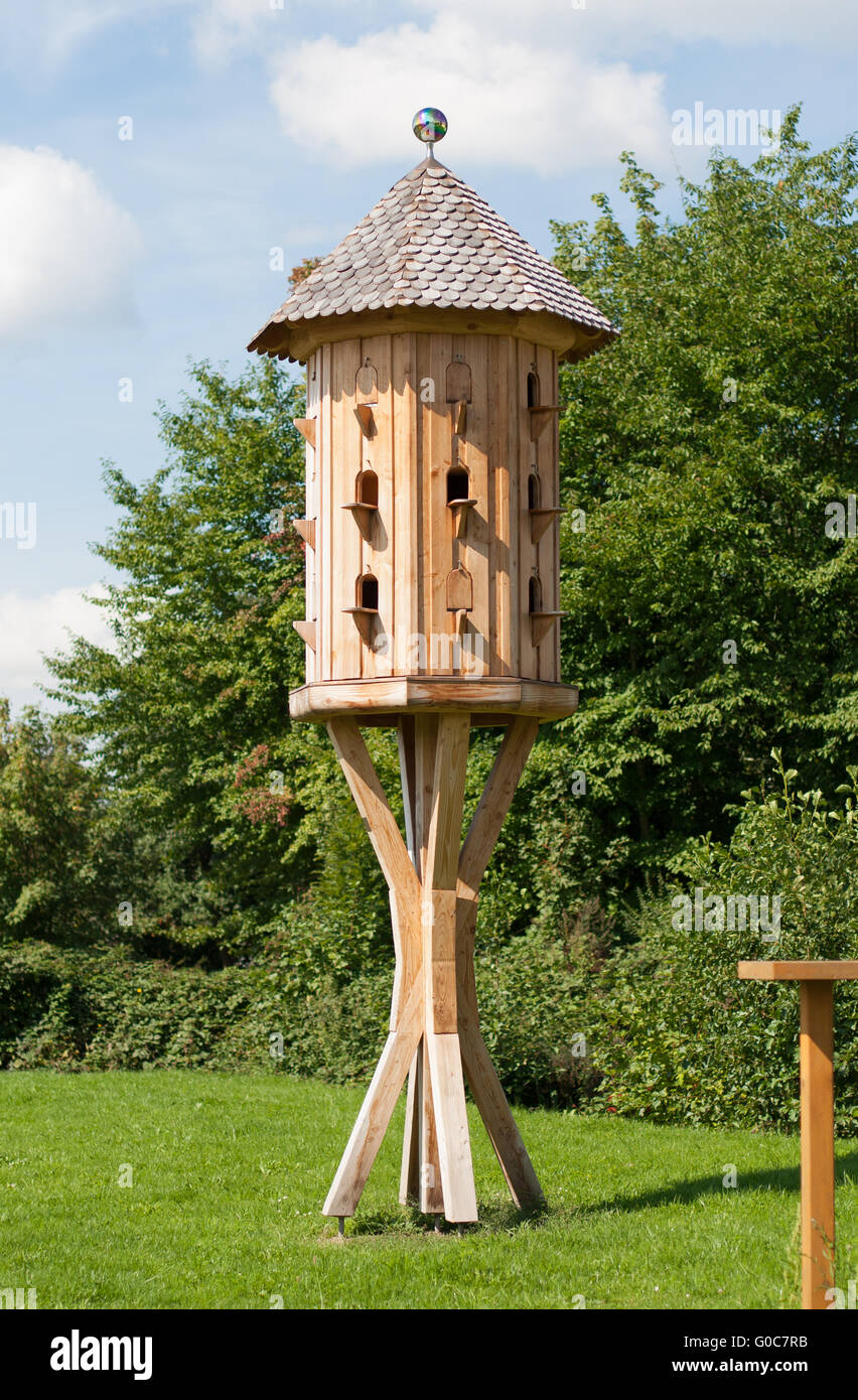 A large bird house on a meadow in a public park Stock Photo - Alamy