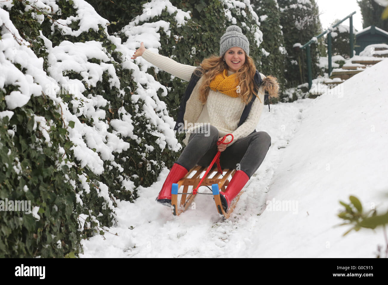 Adult sledging hi-res stock photography and images - Alamy