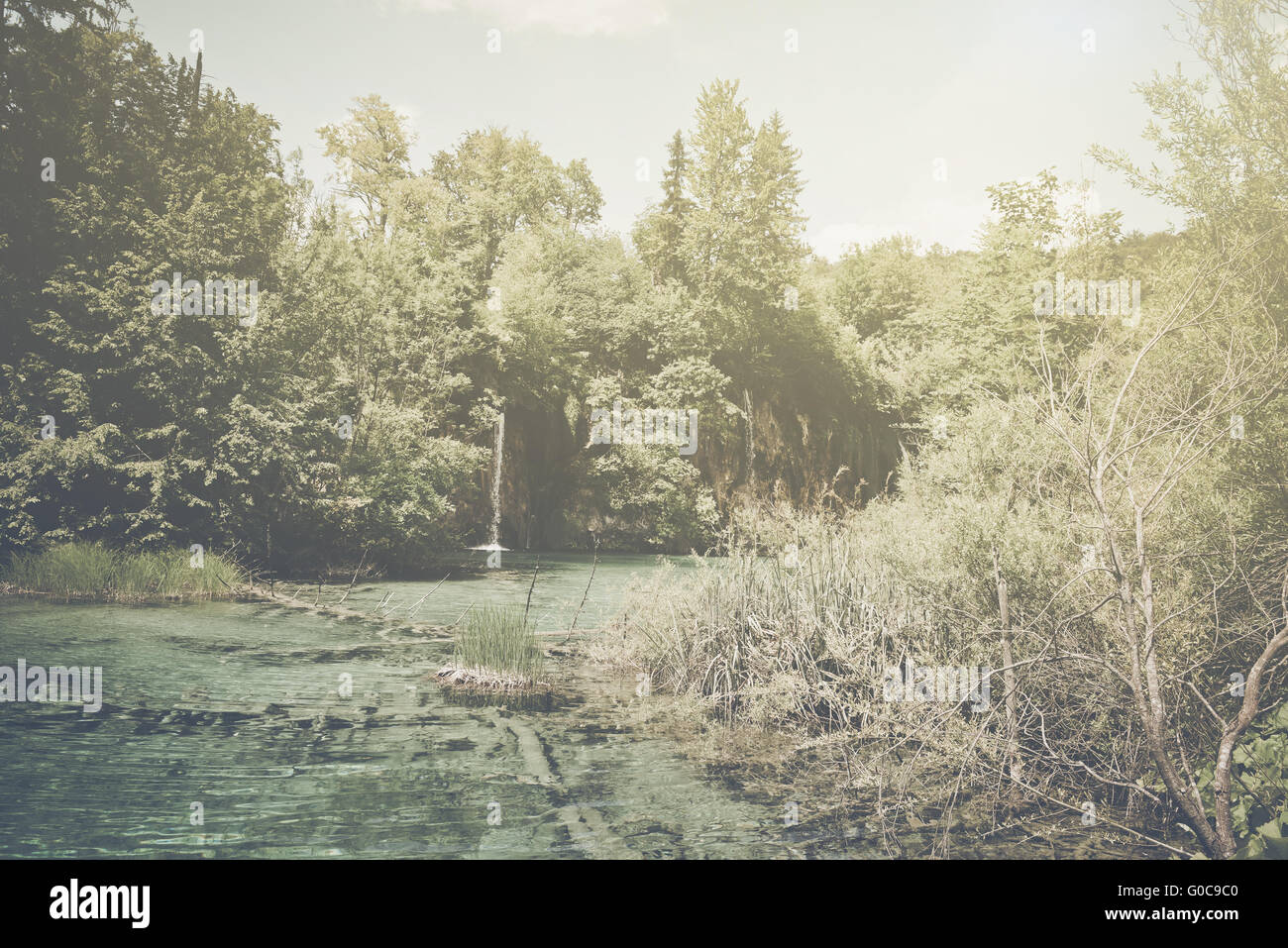 Retro Waterfall with Sunlight with Vintage Film Style Stock Photo - Alamy