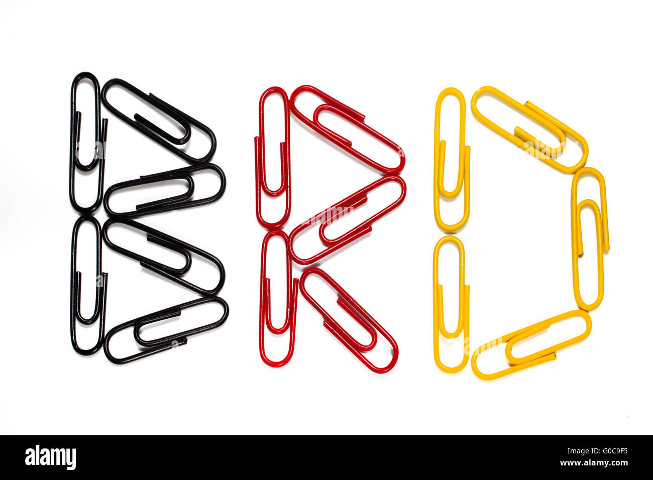 Black, red and yellow paper clips, Germany Stock Photo - Alamy