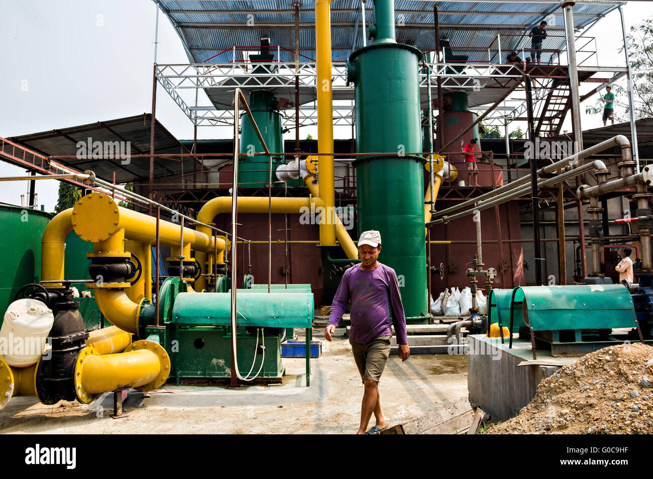 a man walking in a Biomass plant in a factory in Hetauda Industrial ...
