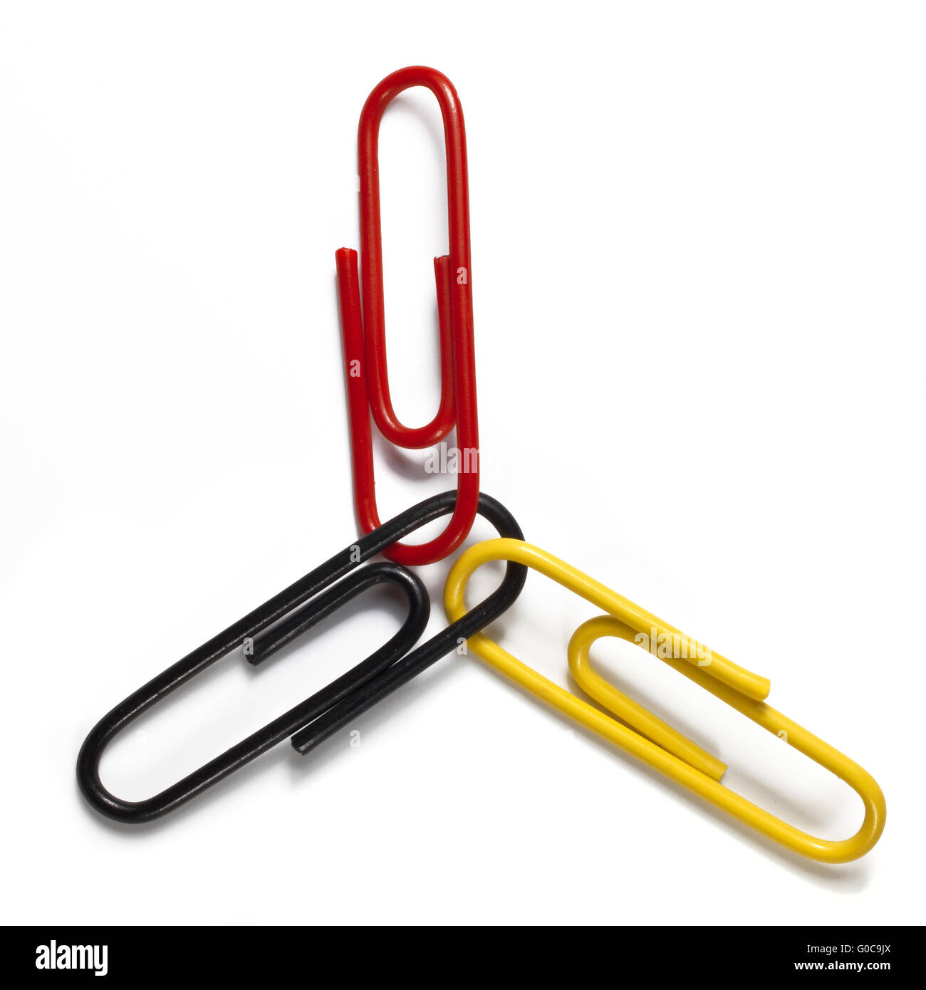 Black, red and yellow paper clips, Germany Stock Photo - Alamy