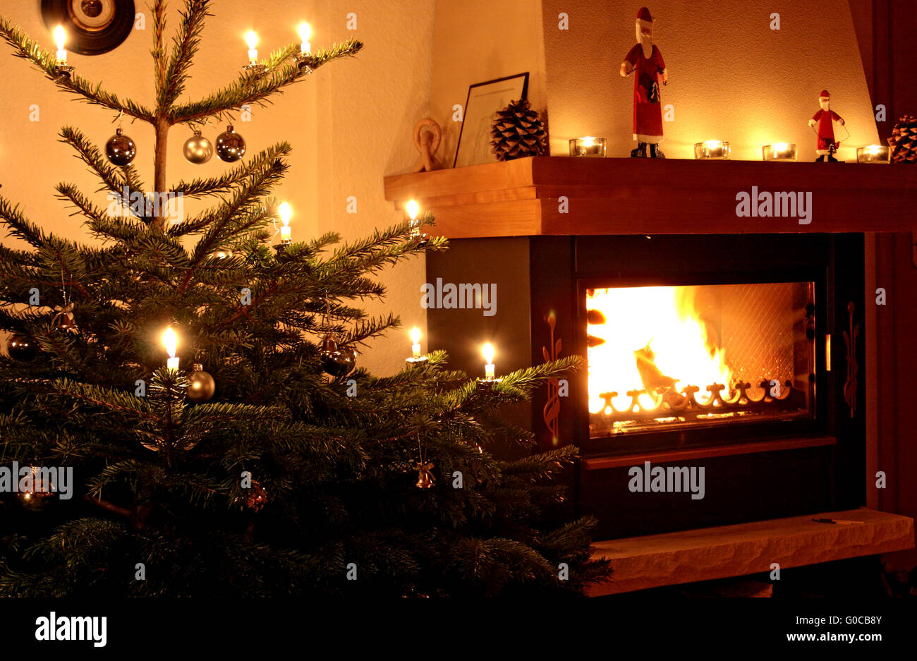 Christmas tree and fire Stock Photo - Alamy