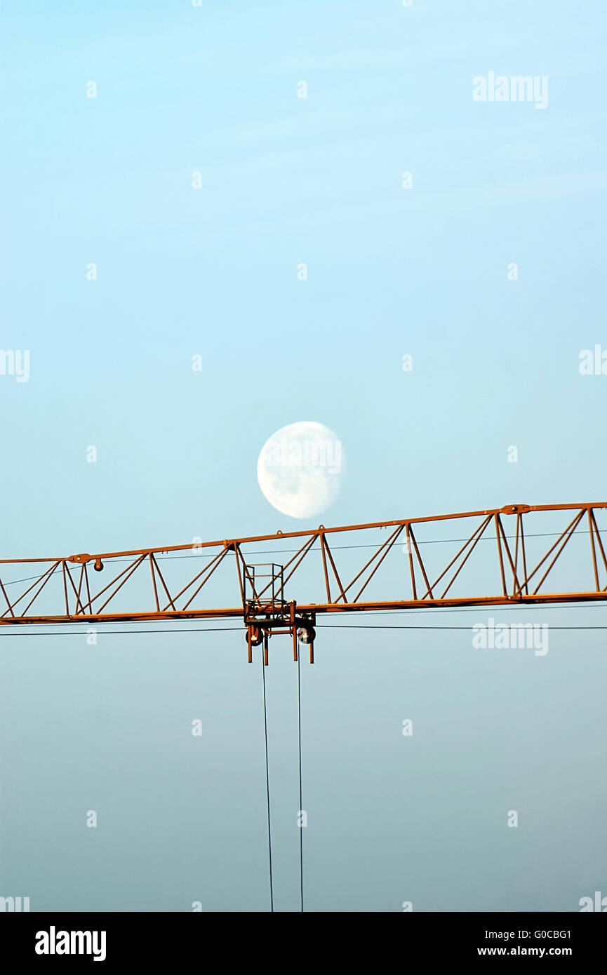 Crane with moon hi-res stock photography and images - Alamy
