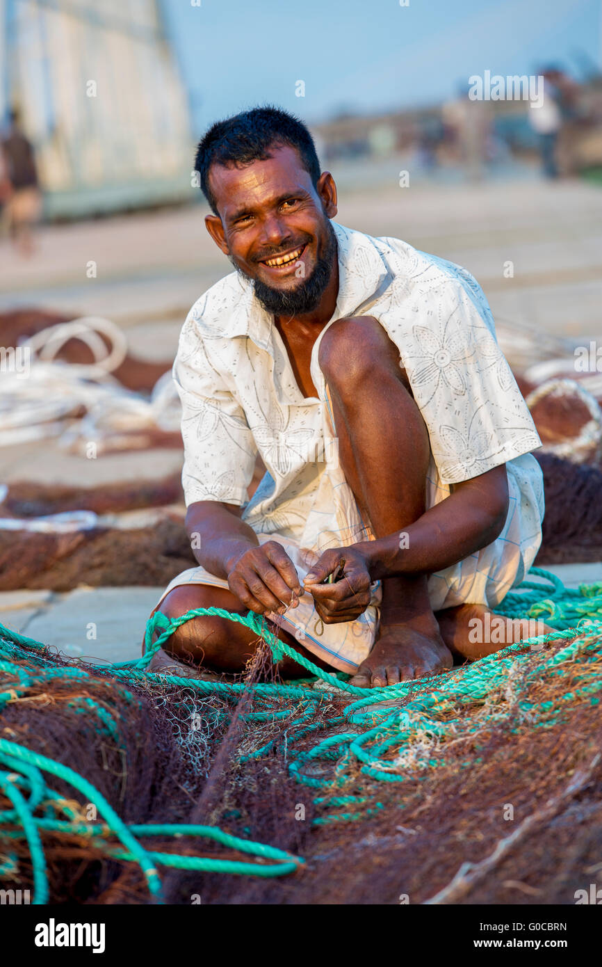 A fisherman smiling Stock Photo - Alamy