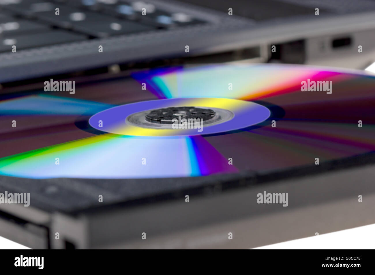 Laptop with open DVD tray isolated on a white Stock Photo - Alamy
