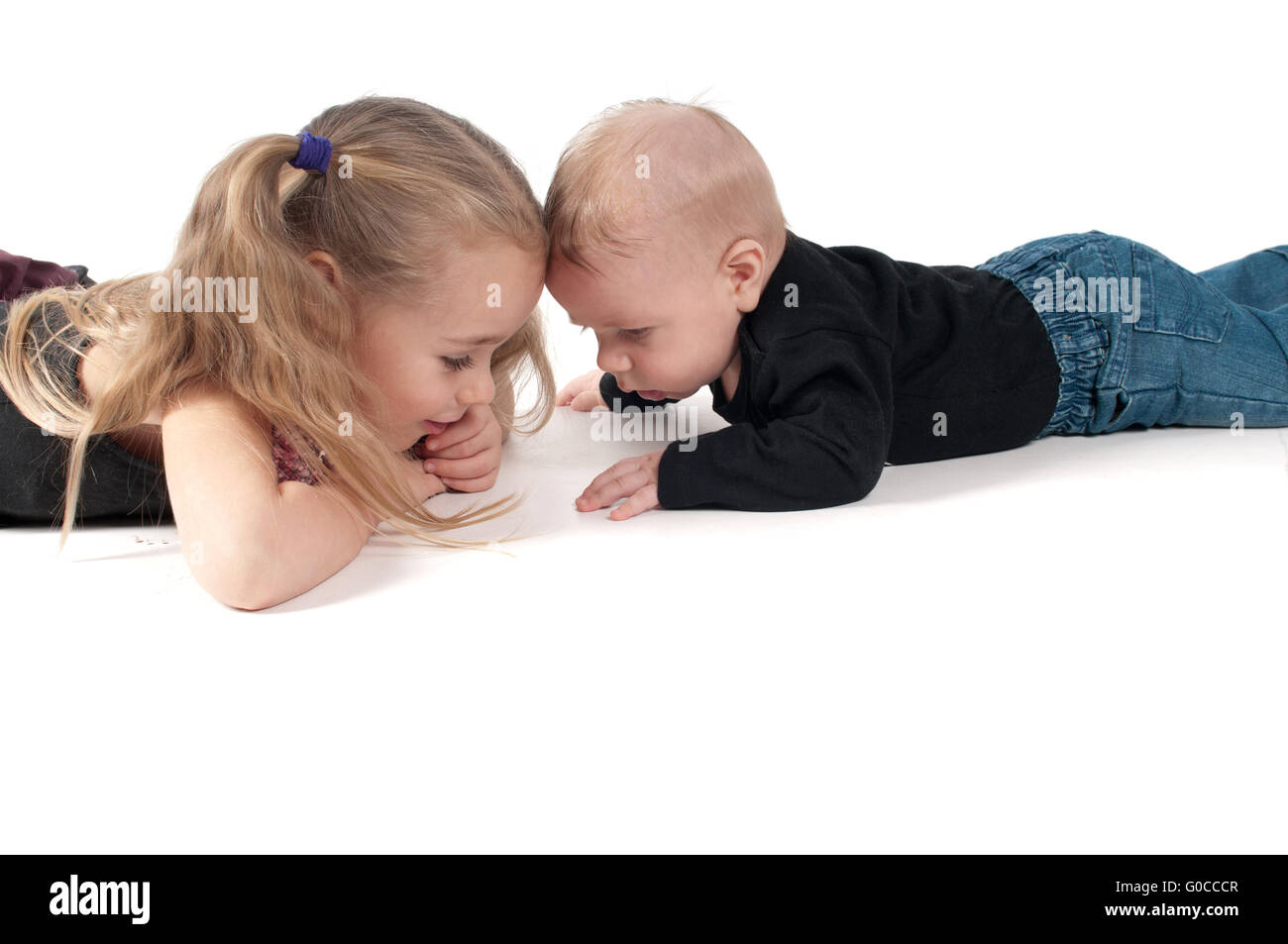 Children touching foreheads hi-res stock photography and images - Alamy