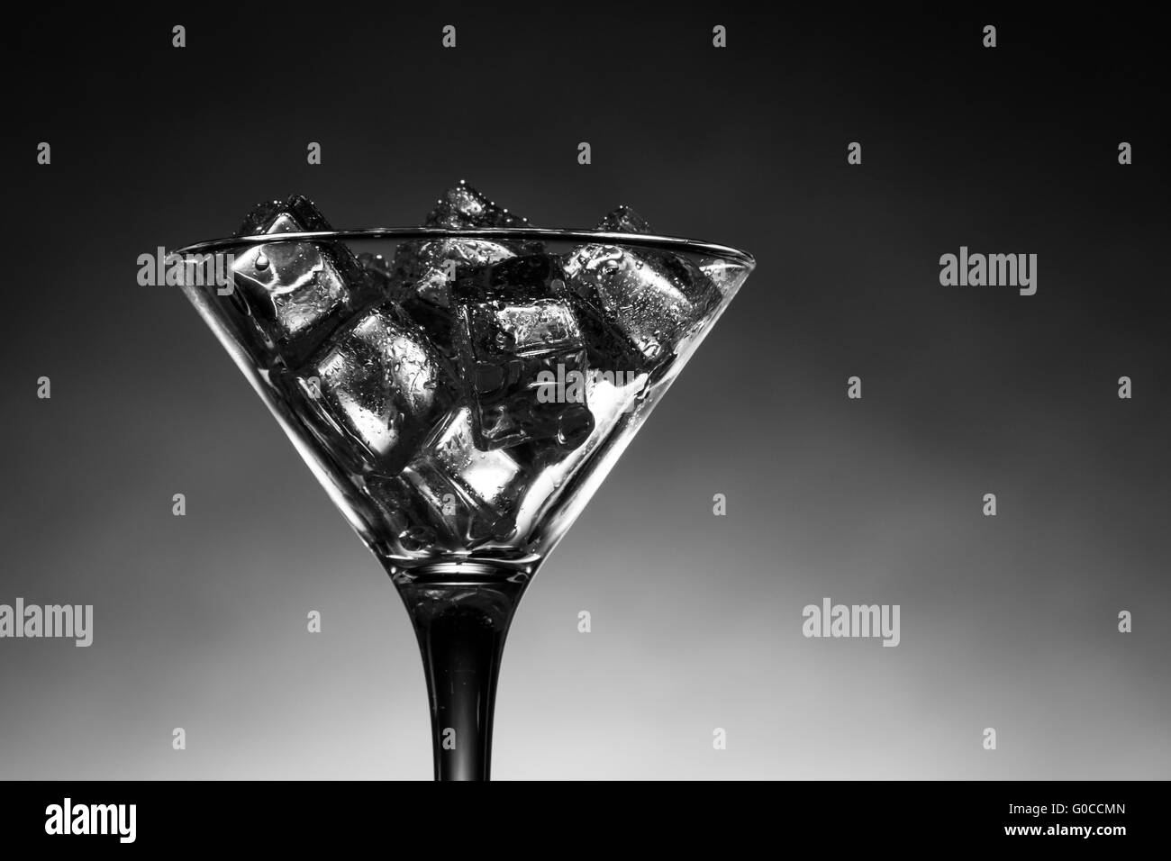 Close up of martini glass filled with ice cubes Stock Photo - Alamy
