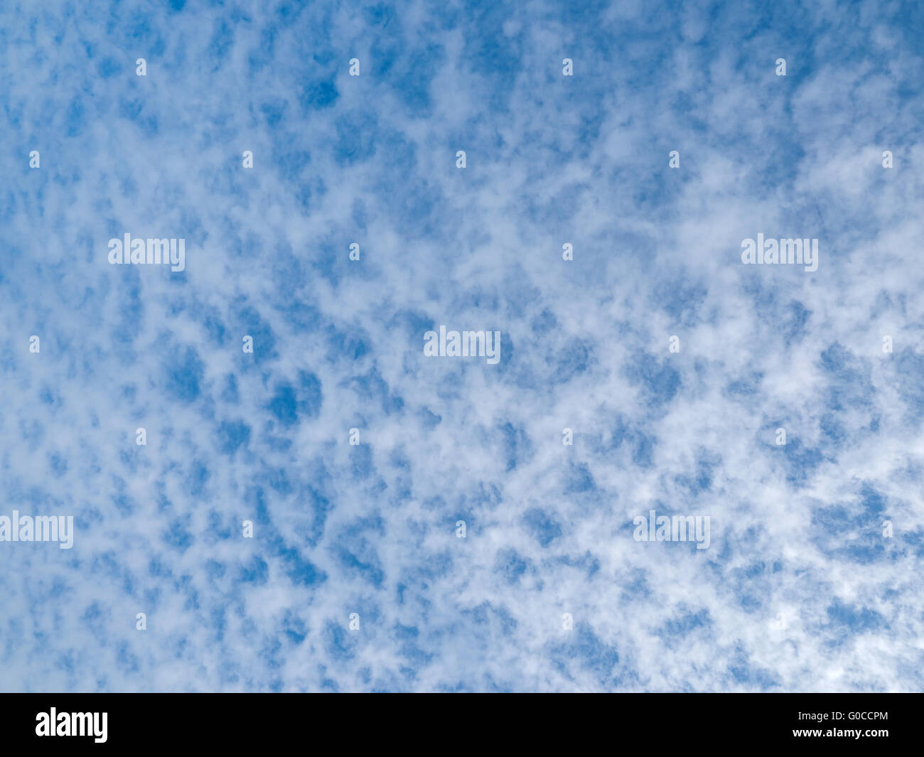 Lots of cloud dots on blue sky Stock Photo - Alamy