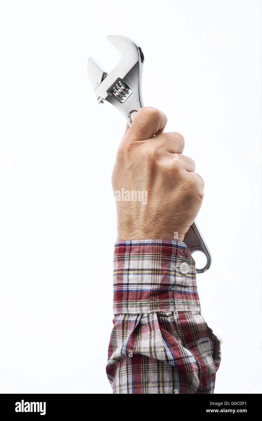 Male hand holding an adjustable wrench on white background Stock Photo ...