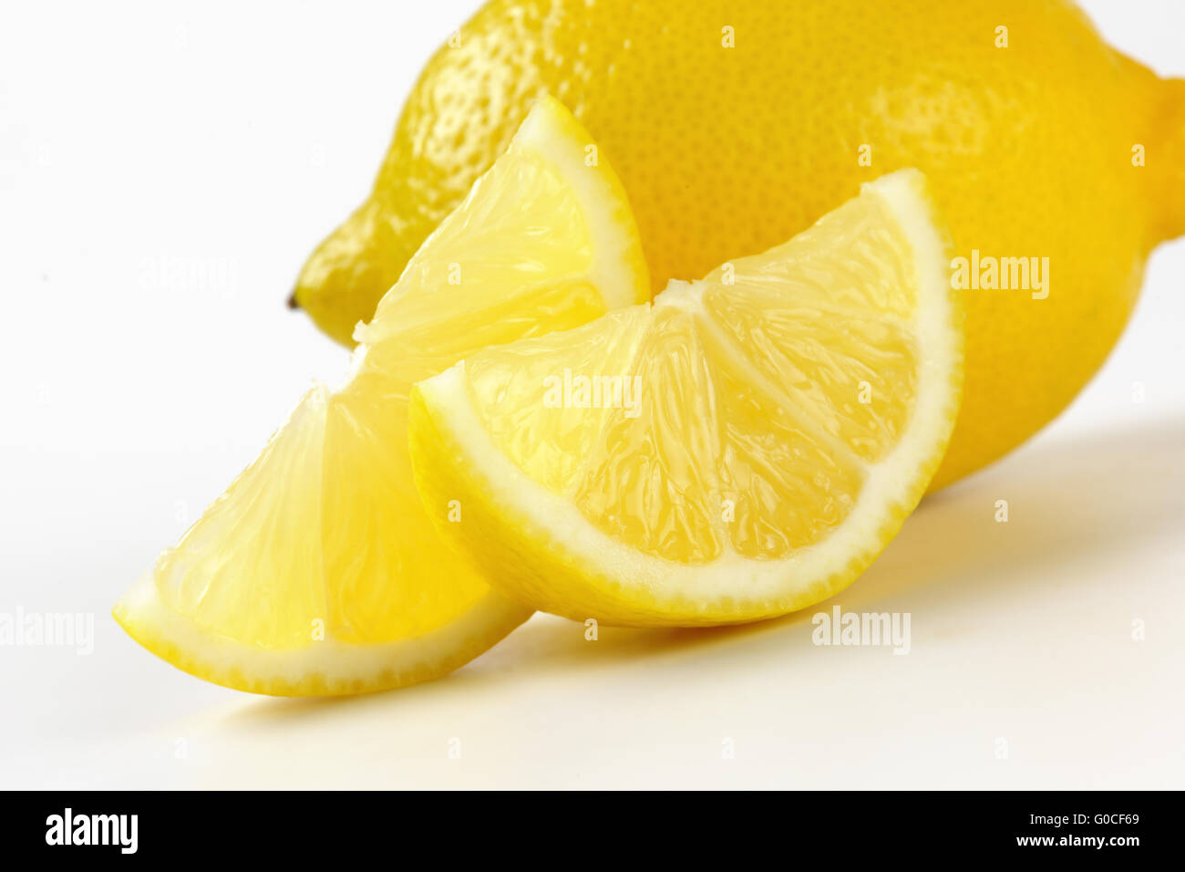 close up of fresh juicy lemons on white background Stock Photo - Alamy