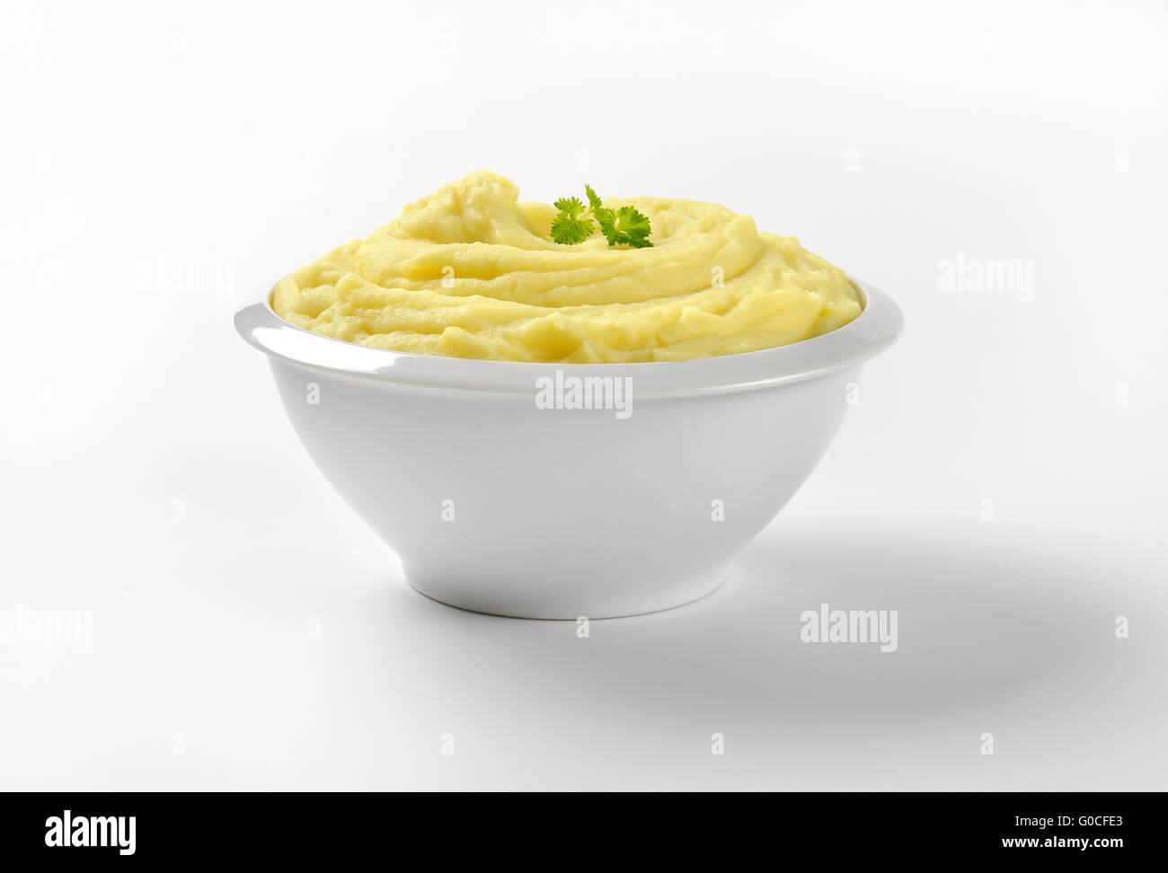 bowl of mashed potato puree on white background Stock Photo - Alamy