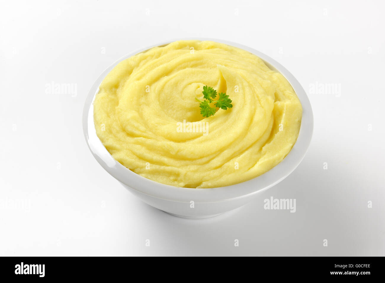 bowl of mashed potato puree on white background Stock Photo - Alamy