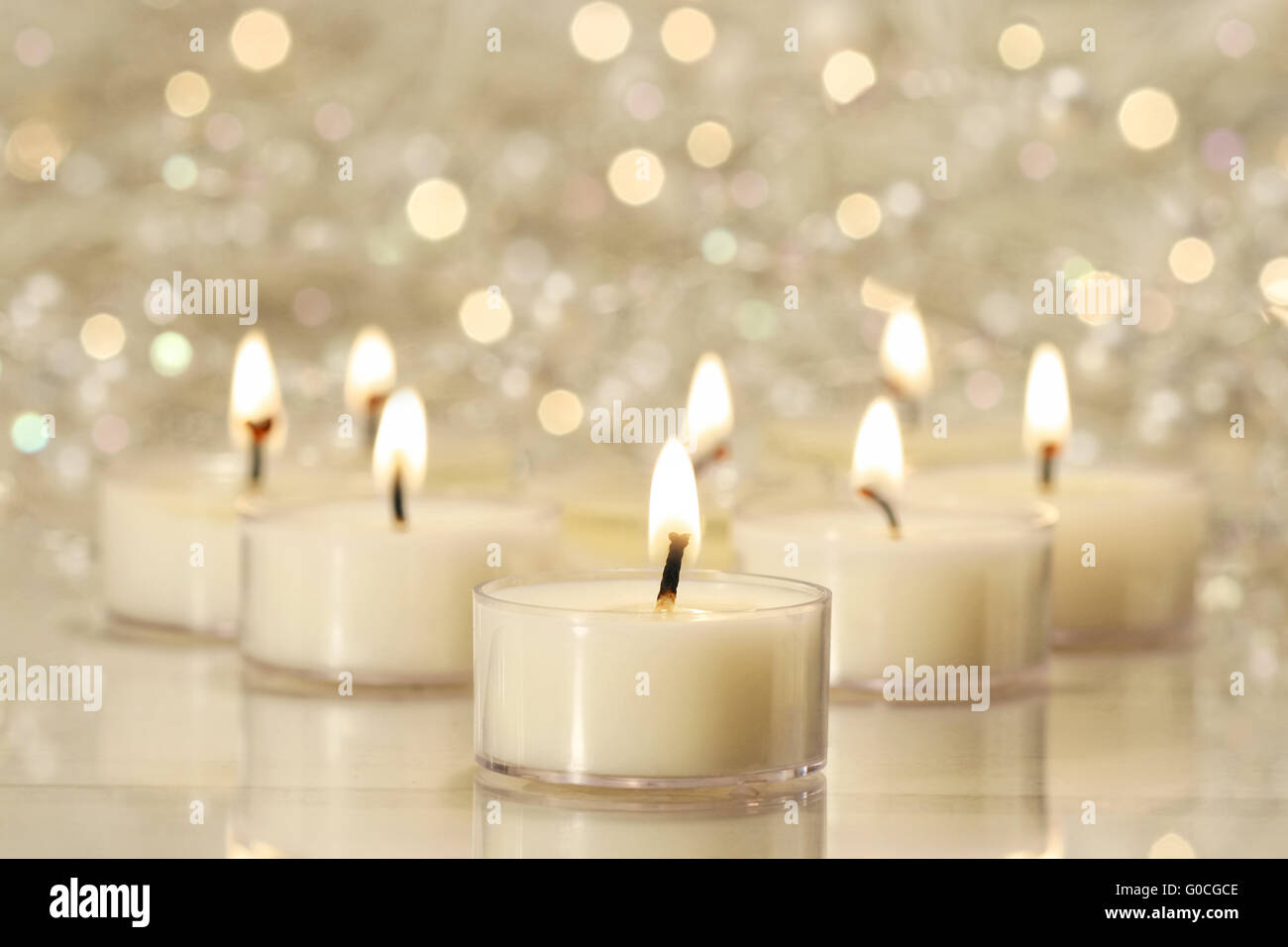 A group of tea lights for holiday celebrations Stock Photo - Alamy