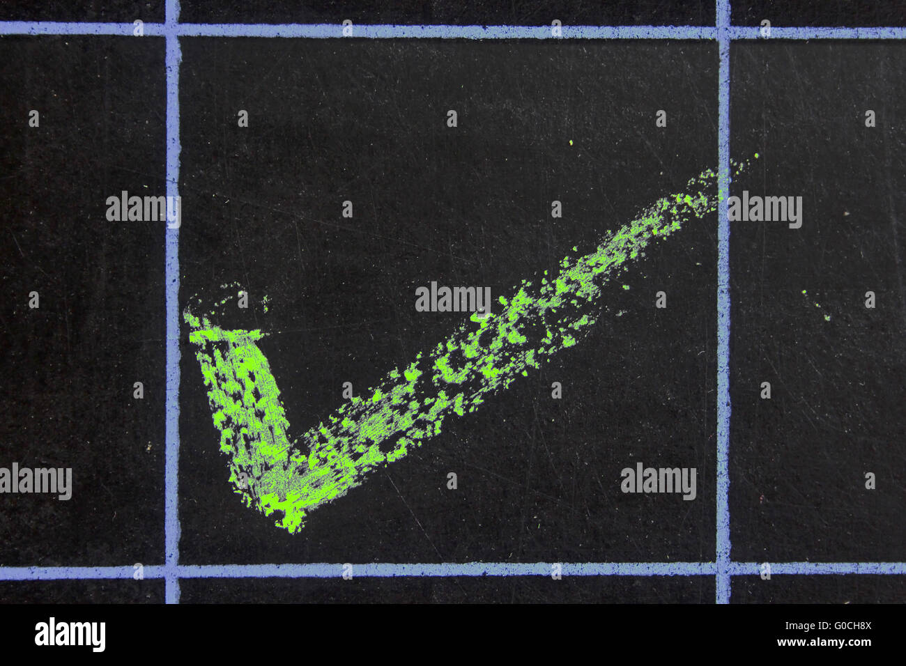 right marks symbols handwritten on black chalkboard Stock Photo - Alamy