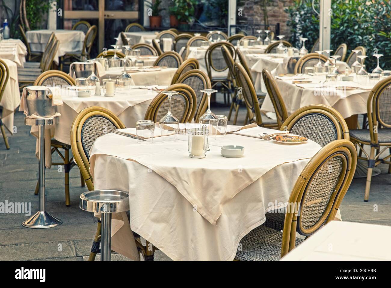 Empty restaurant tables in the Italian city of Venice Stock Photo - Alamy