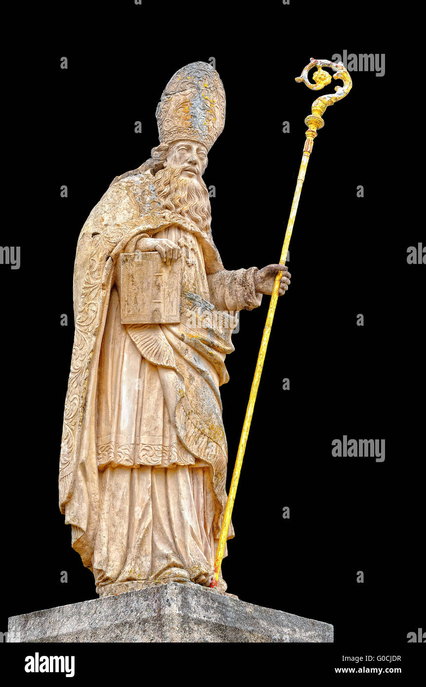 Sculpture of St. Blaise with black background Stock Photo - Alamy