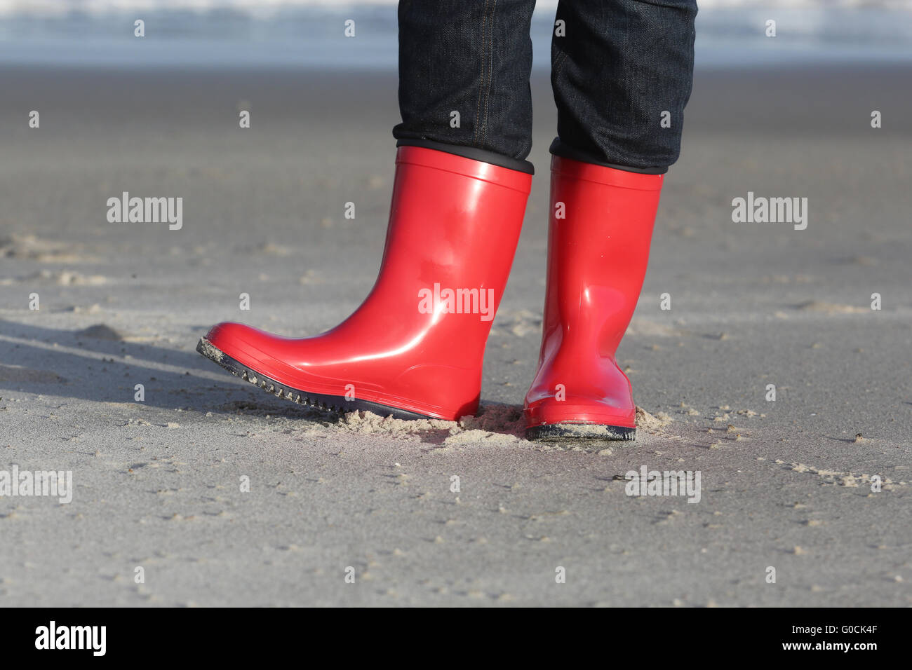 Red Rubber Boots Stock Photo - Alamy