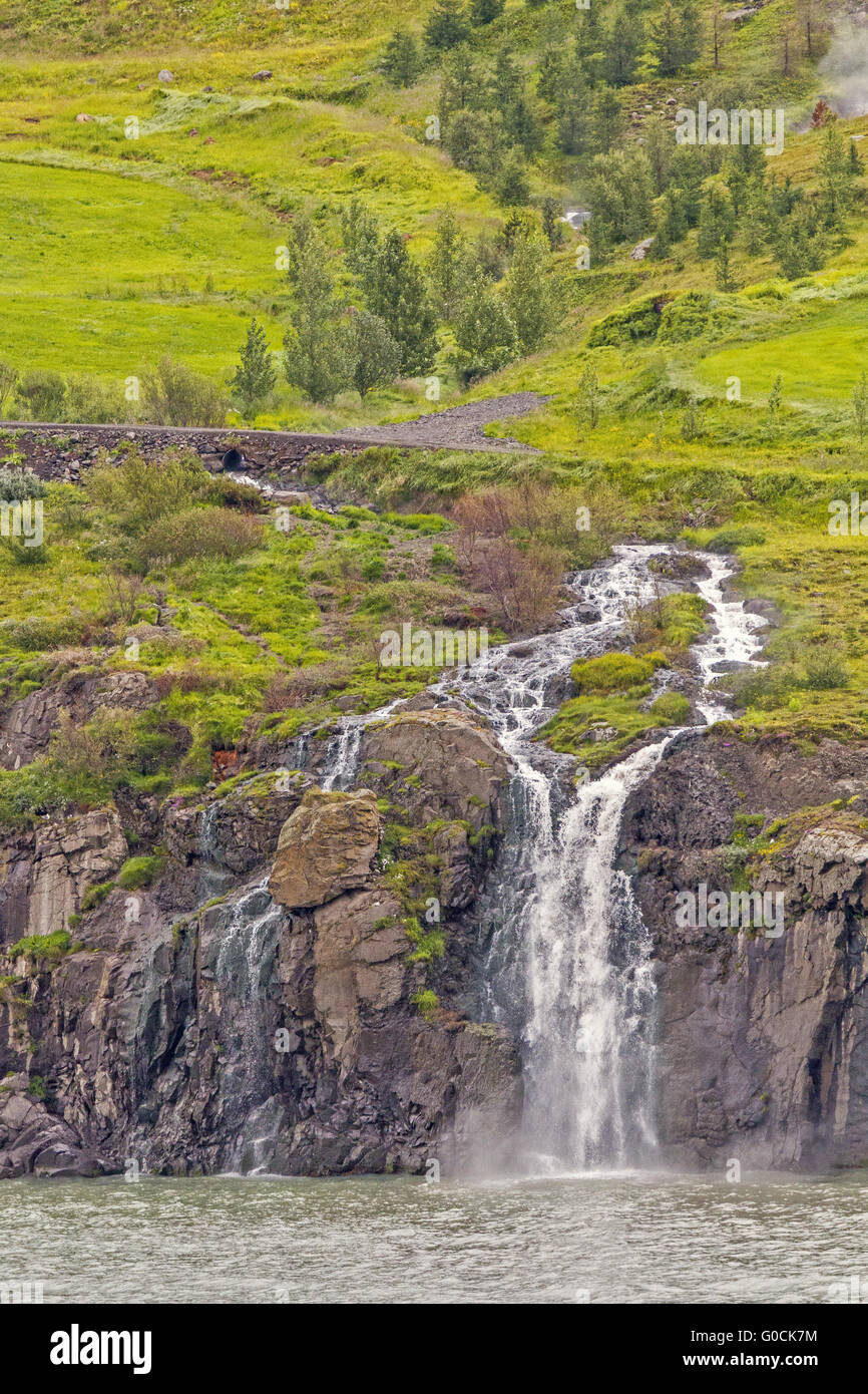 River Flowing Into The Sea Akureyri Stock Photo - Alamy