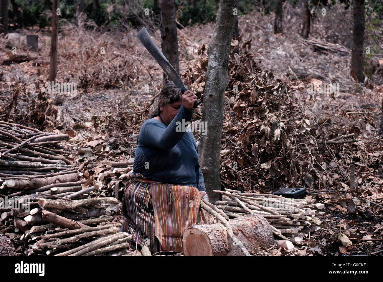 Woman Chopping Wood