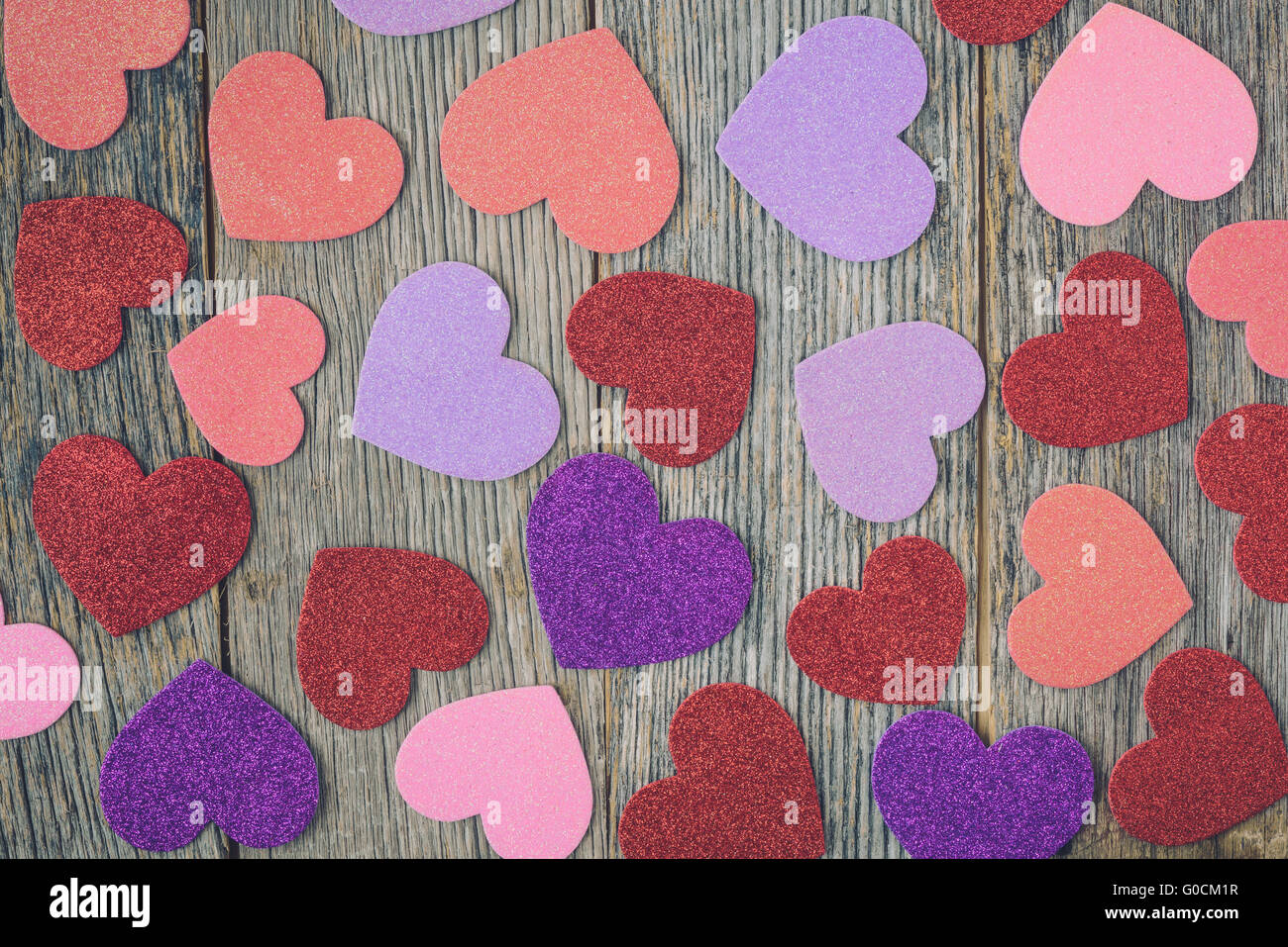 Valentine's Day Top Down Background Blurred with Hearts Stock Photo - Alamy