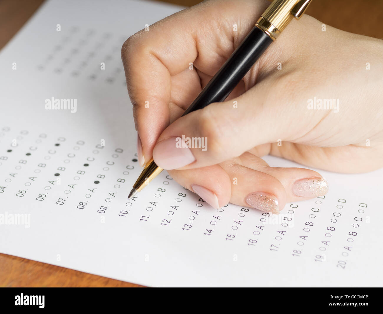 Answering the questions Stock Photo - Alamy