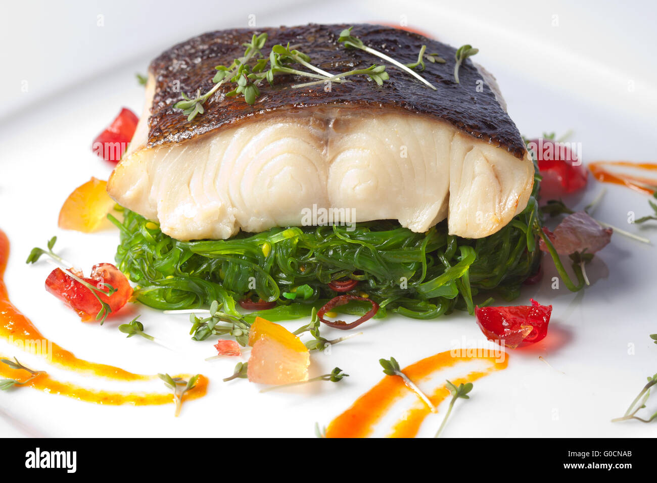 Fish on plate Stock Photo - Alamy
