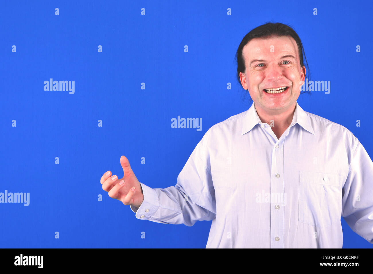 Man against blue background hi-res stock photography and images - Alamy